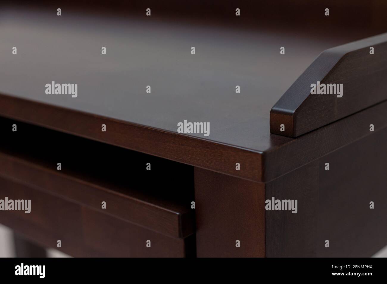 Retractable compact modern table made of wood Stock Photo - Alamy