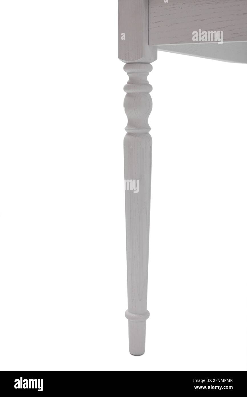 Corner of a white kitchen table. White table isolated on a white ...