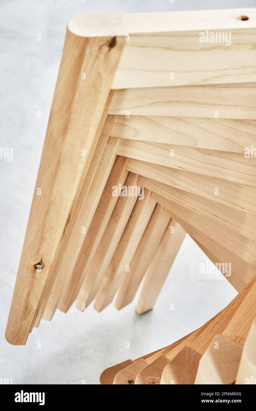 Stacks of new wooden bases with simple legs for elegant chairs ...
