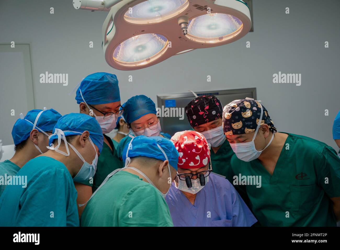 ENSHI, CHINA - MAY 18, 2021 - A volunteer doctor performs free surgery ...