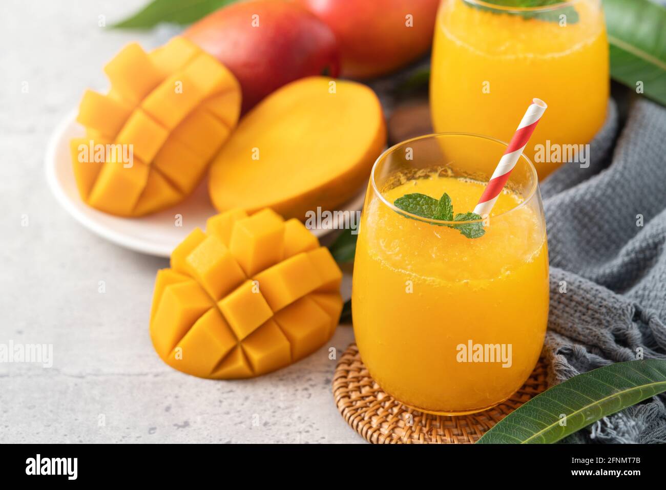 Fresh beautiful delicious mango juice. Close up design concept of ...