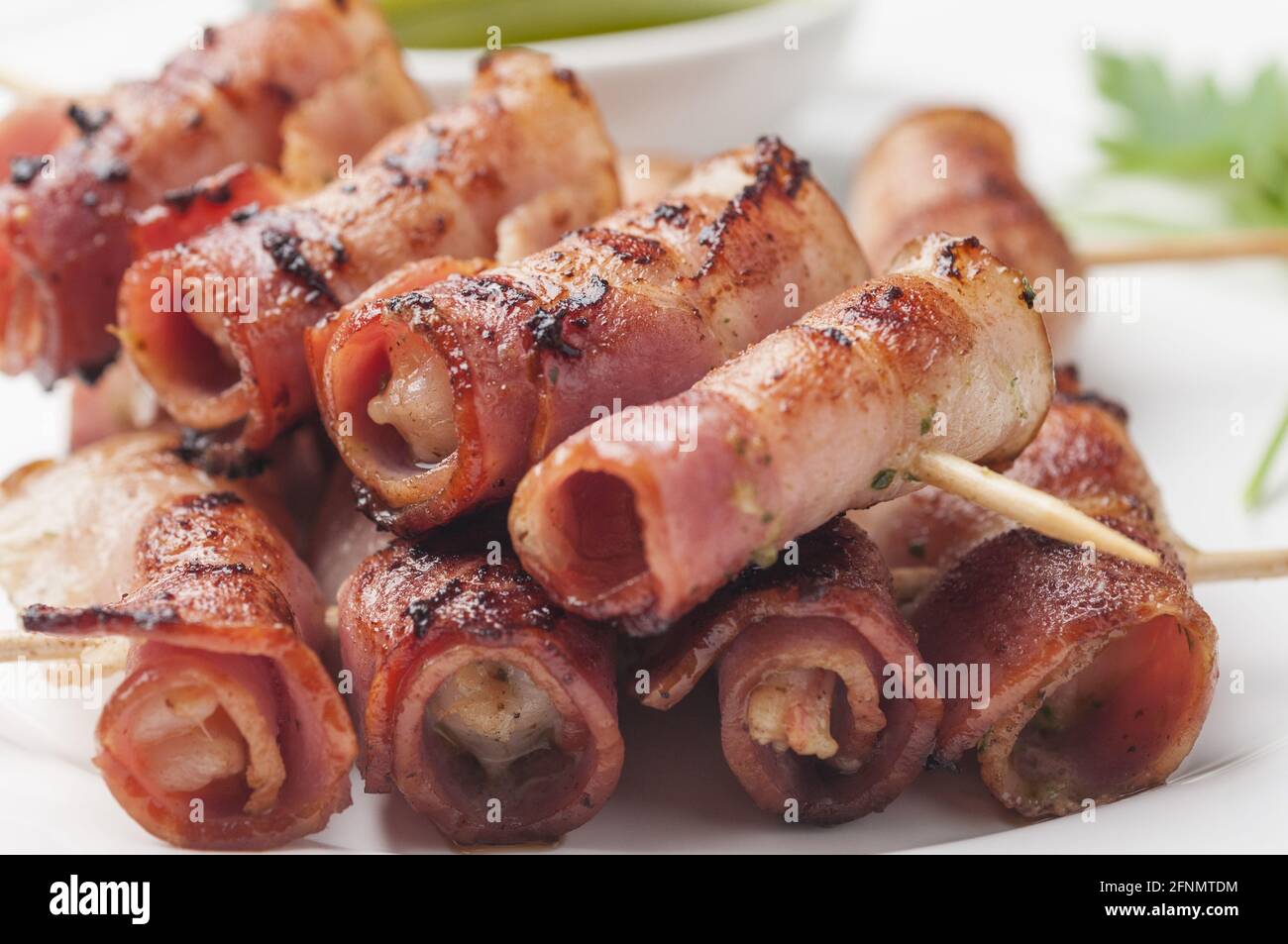 Closeup shot of Skewered prawns wrapped in bacon Stock Photo - Alamy