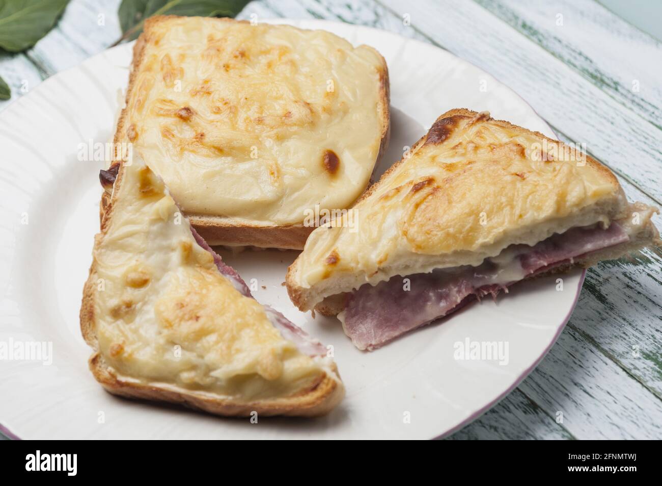French croque-monsieur with bechamel and ham Stock Photo - Alamy