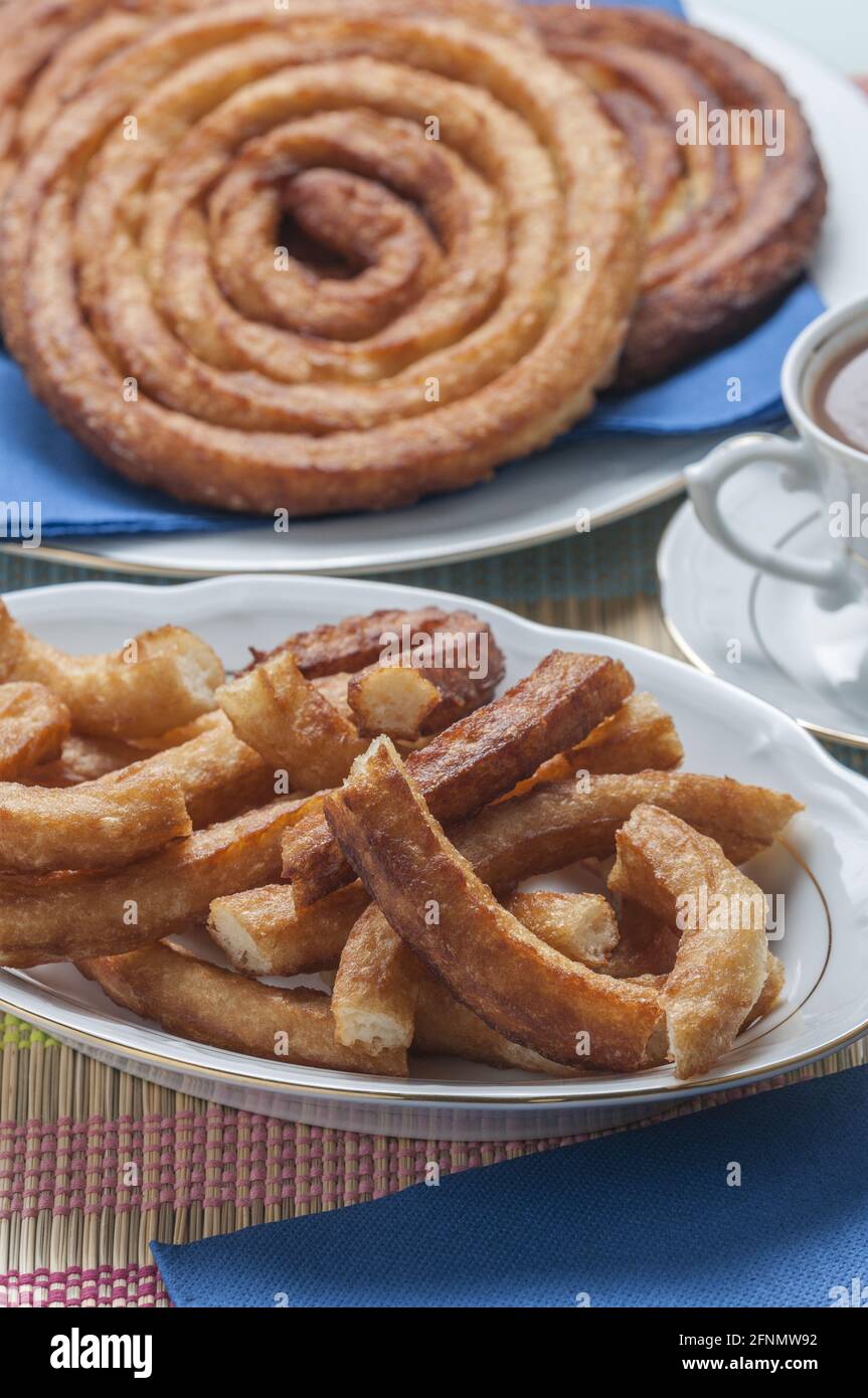 Vertical shot of churros with chocolate Stock Photo - Alamy