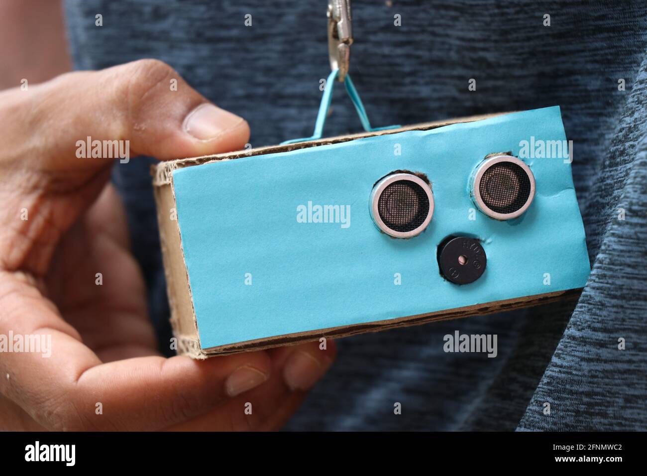 Social Distancing Alarm System Using Ultrasonic Sensor And Buzzer Which Is Wearable And Held In
