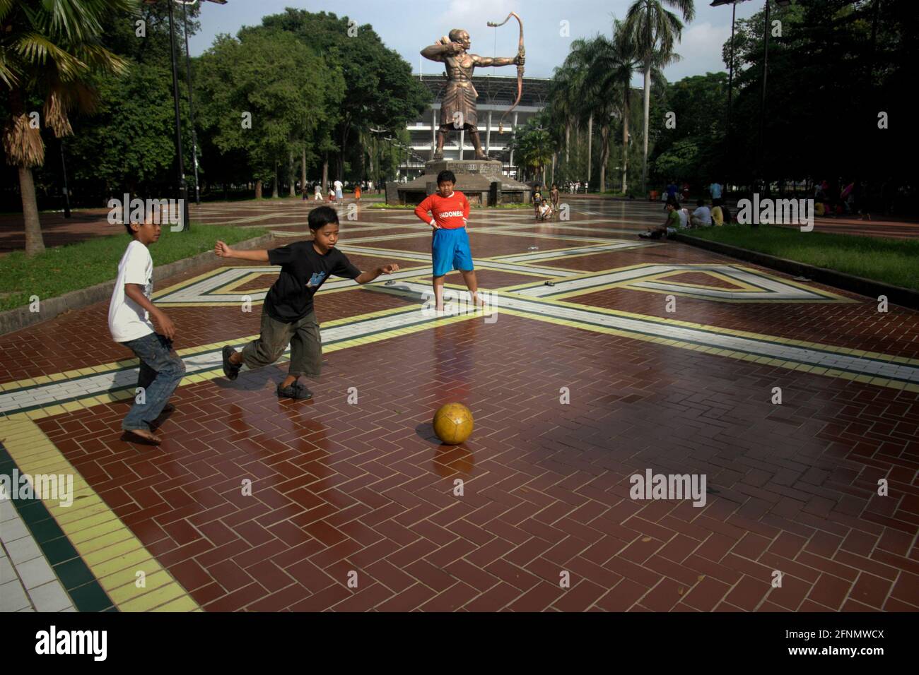 Children playing football in Senayan Sports Complex (Gelora Bung Karno ...