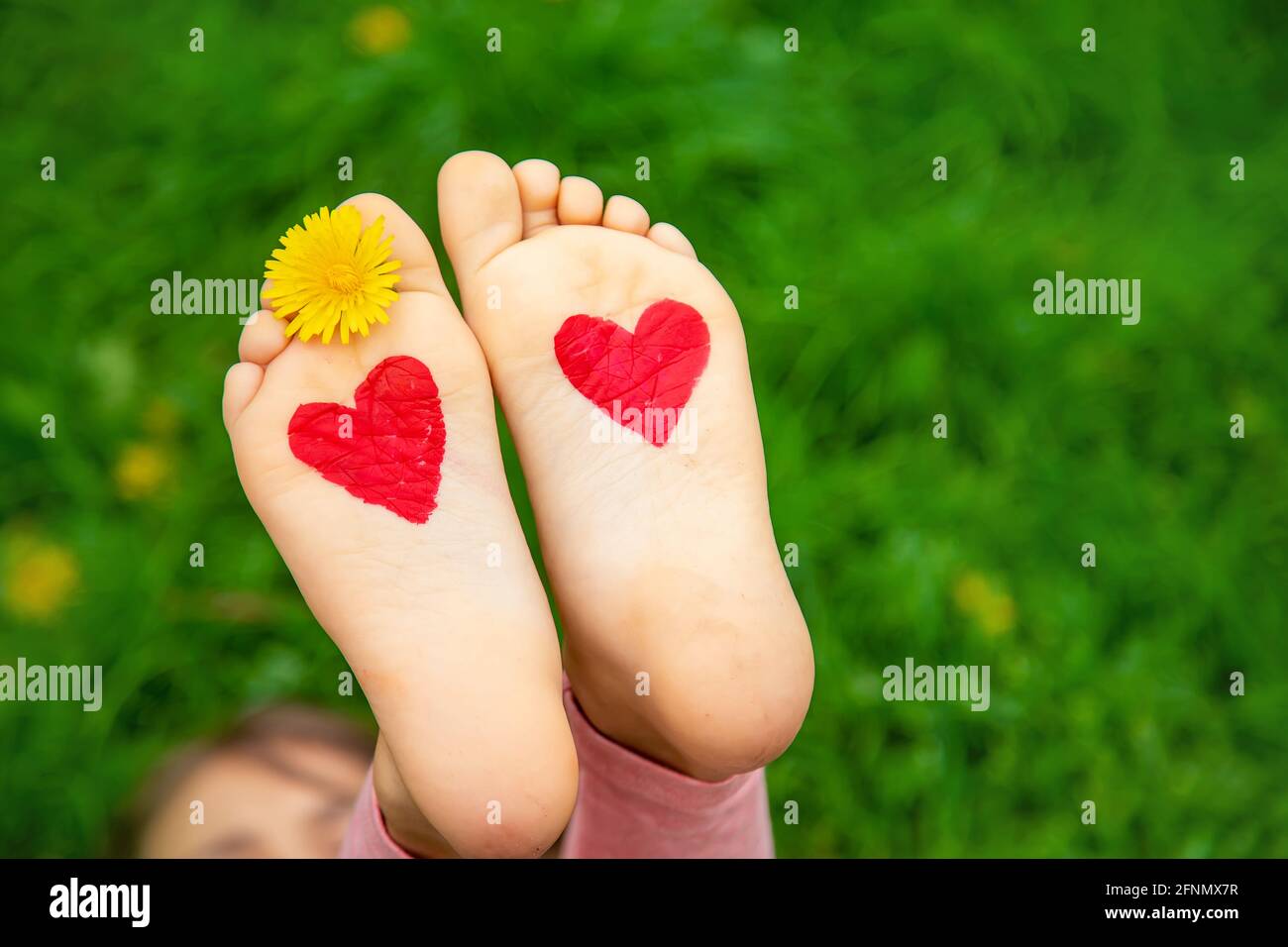 Baby feet in flower hi-res stock photography and images - Alamy