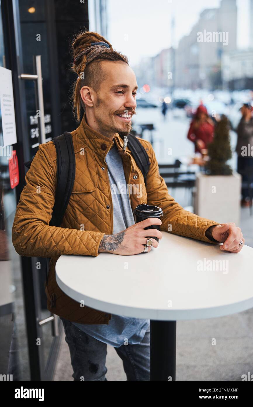 Feeling much better after having some coffee Stock Photo - Alamy