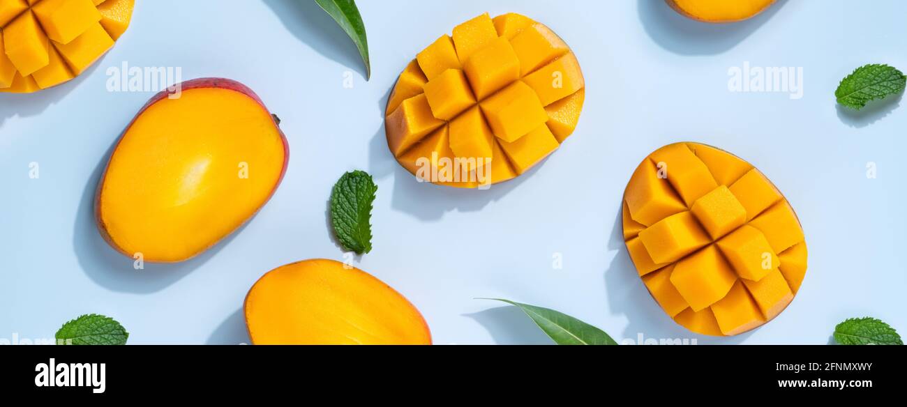 Mango design concept. Top view of diced fresh mango fruit pattern on ...