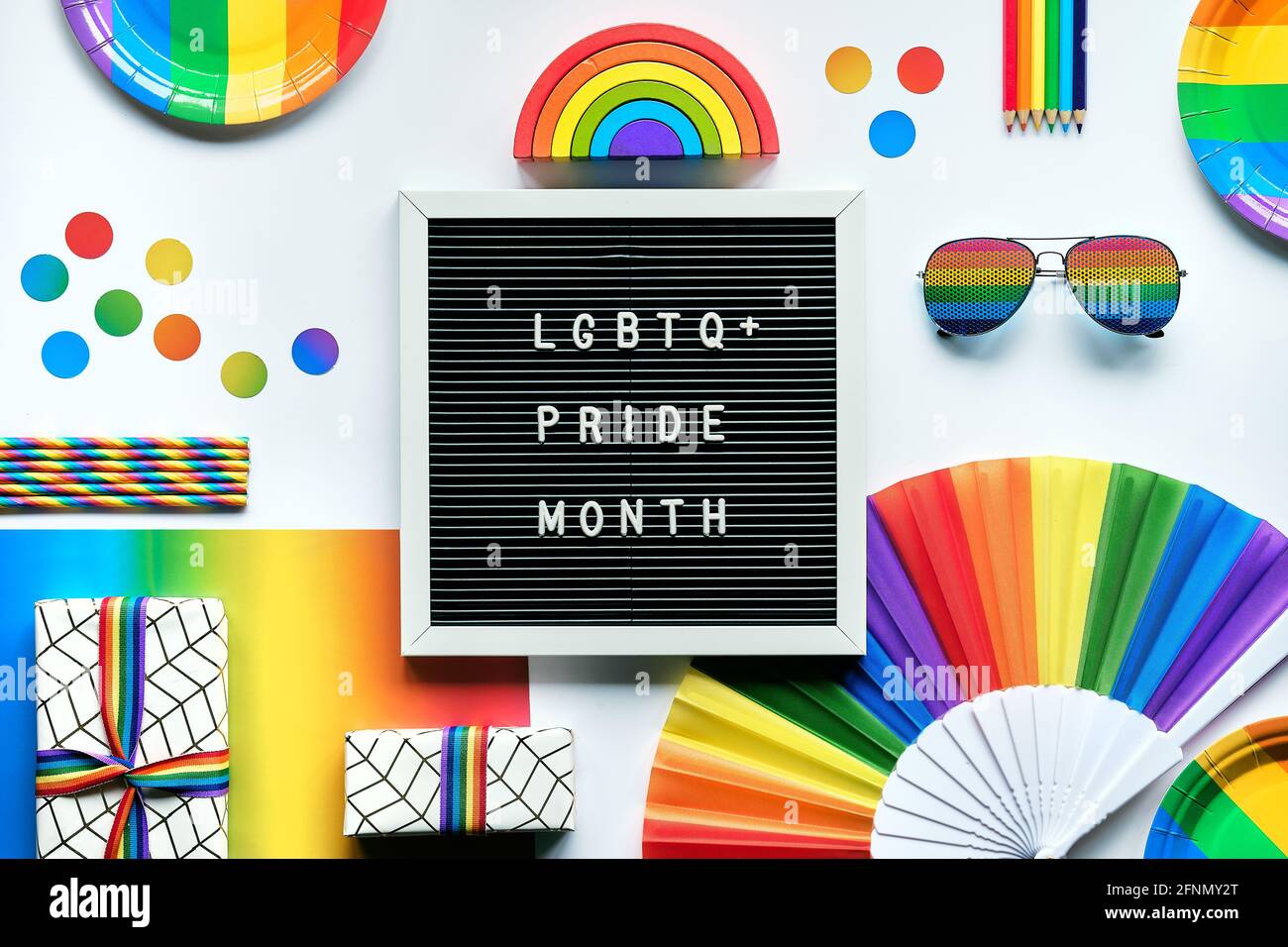 LGBTQ pride month text on letter board. Black letterboard with rainbow ...