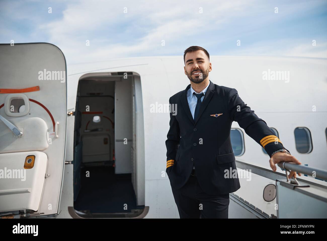 Smiling Male Pilot Standing Airplane High Resolution Stock Photography ...