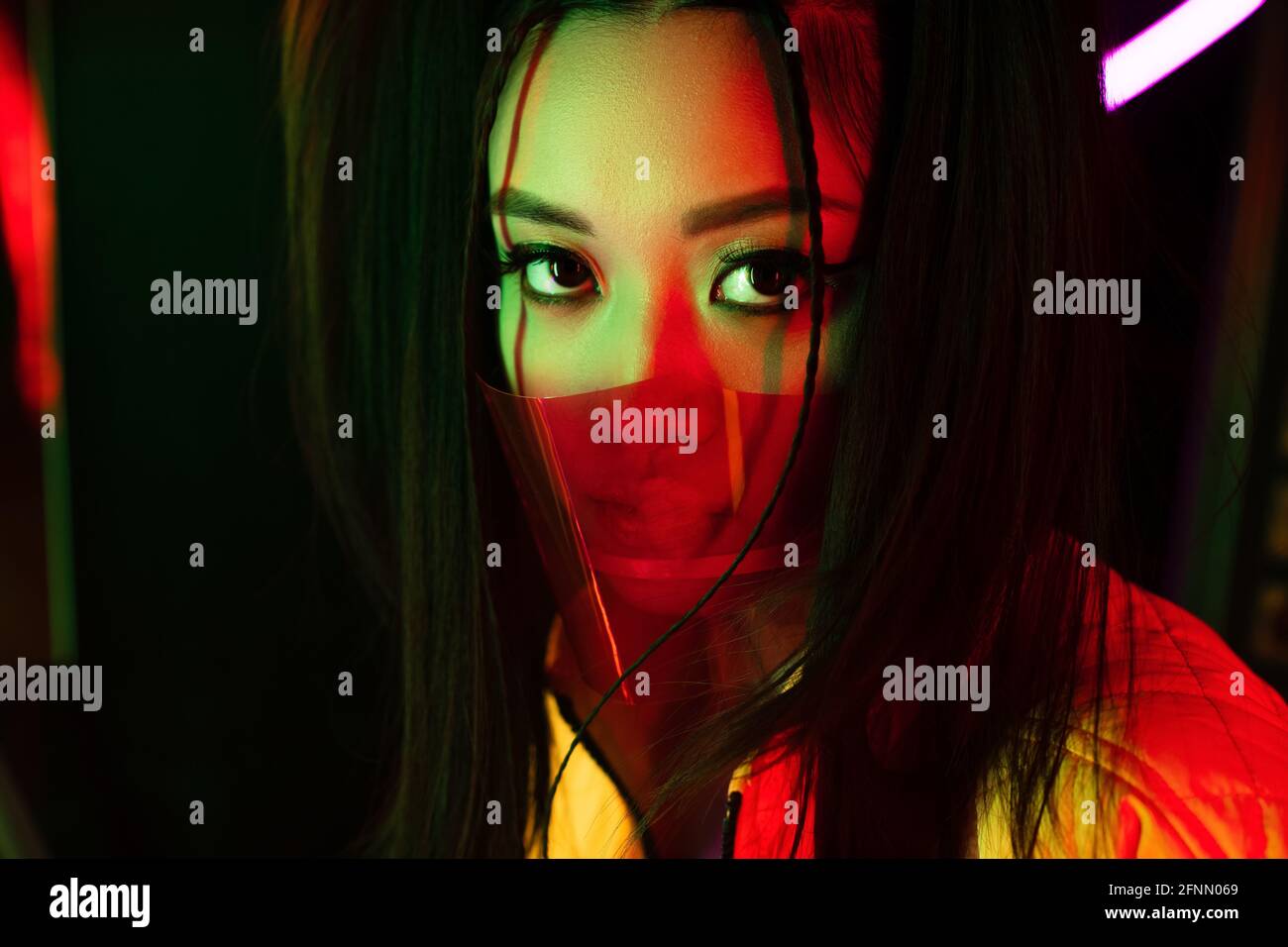 pretty young asian woman in face shield looking at camera Stock Photo ...