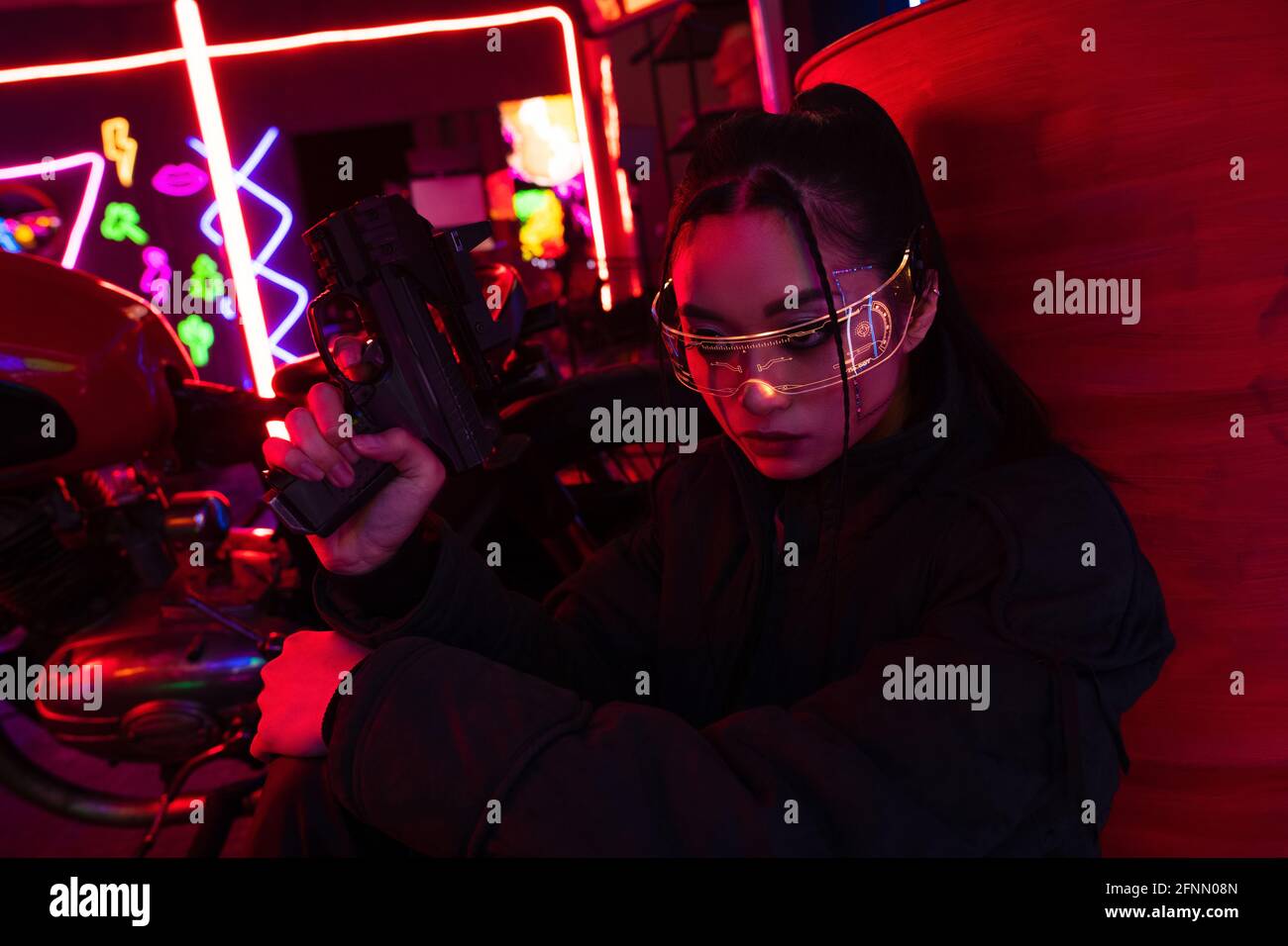 Woman gun asian hi-res stock photography and images - Alamy