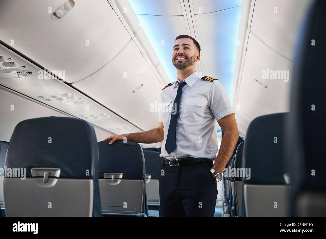 Young pilot feeling inspired before the flight Stock Photo - Alamy