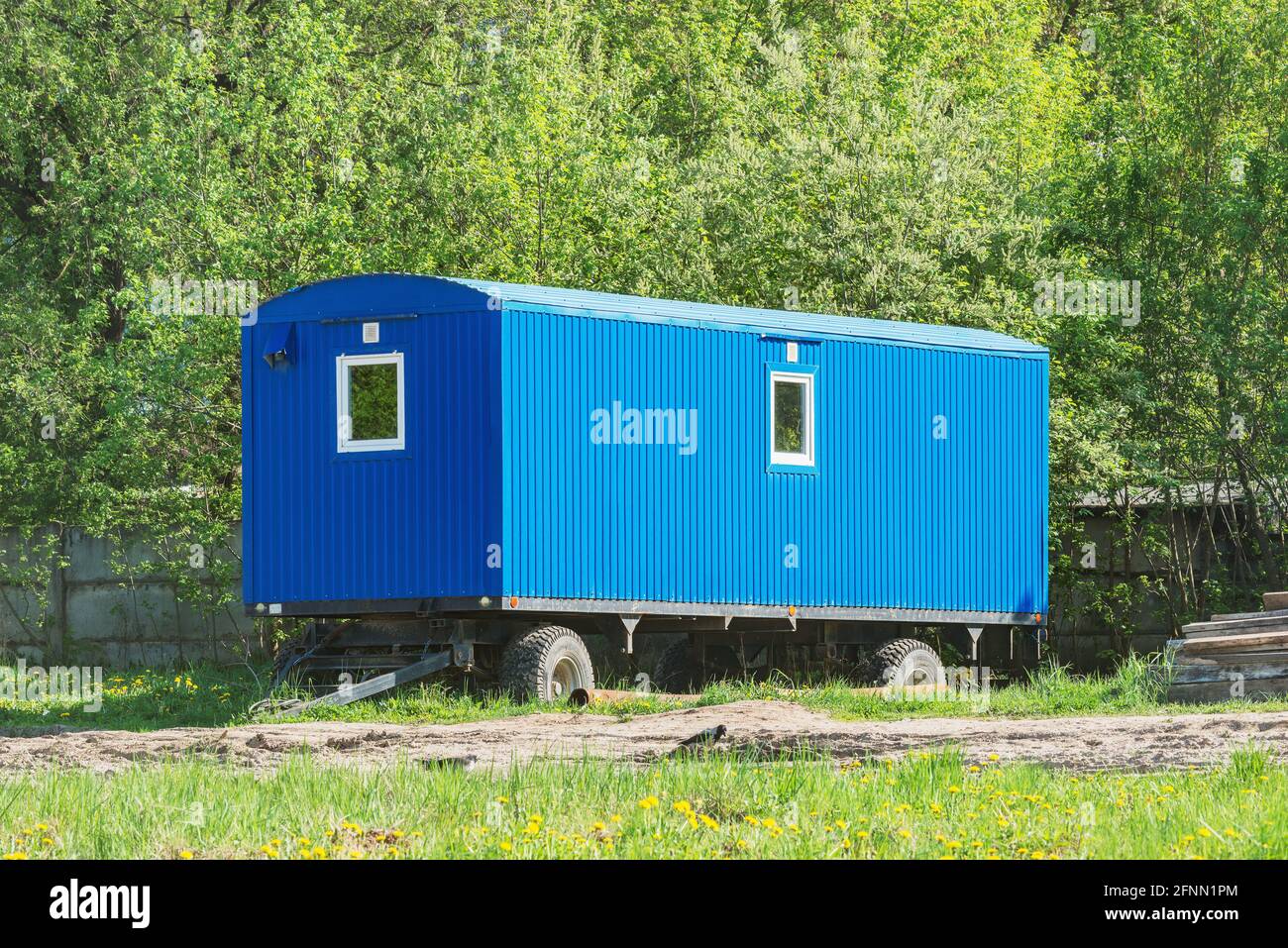 Change house for builders by the comstruction site Stock Photo - Alamy