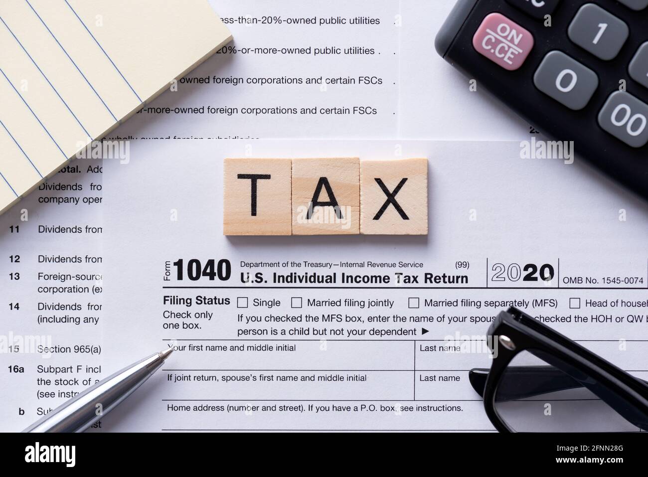Income tax word hi-res stock photography and images - Alamy