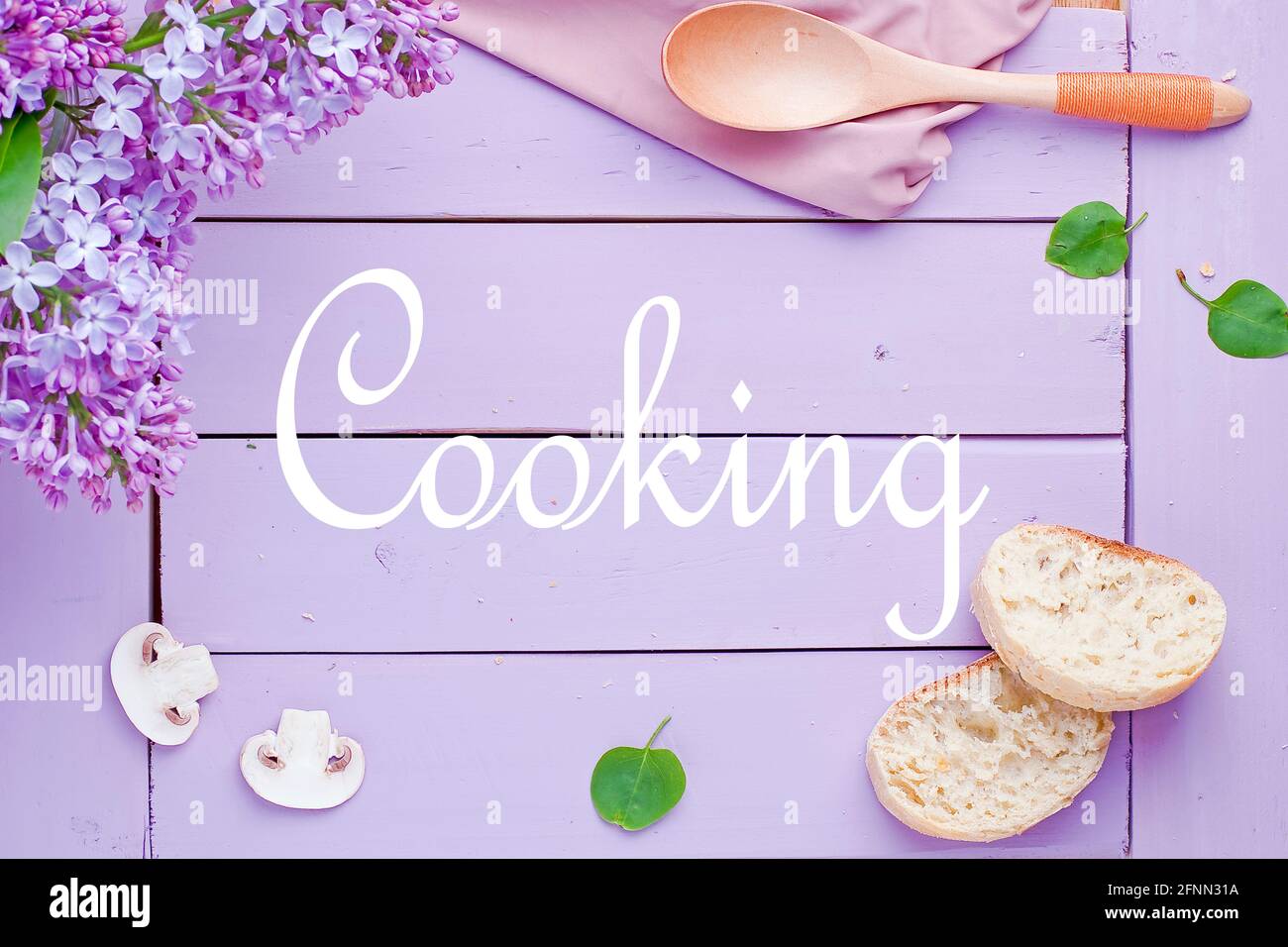 the inscription cooking on a purple background Stock Photo - Alamy