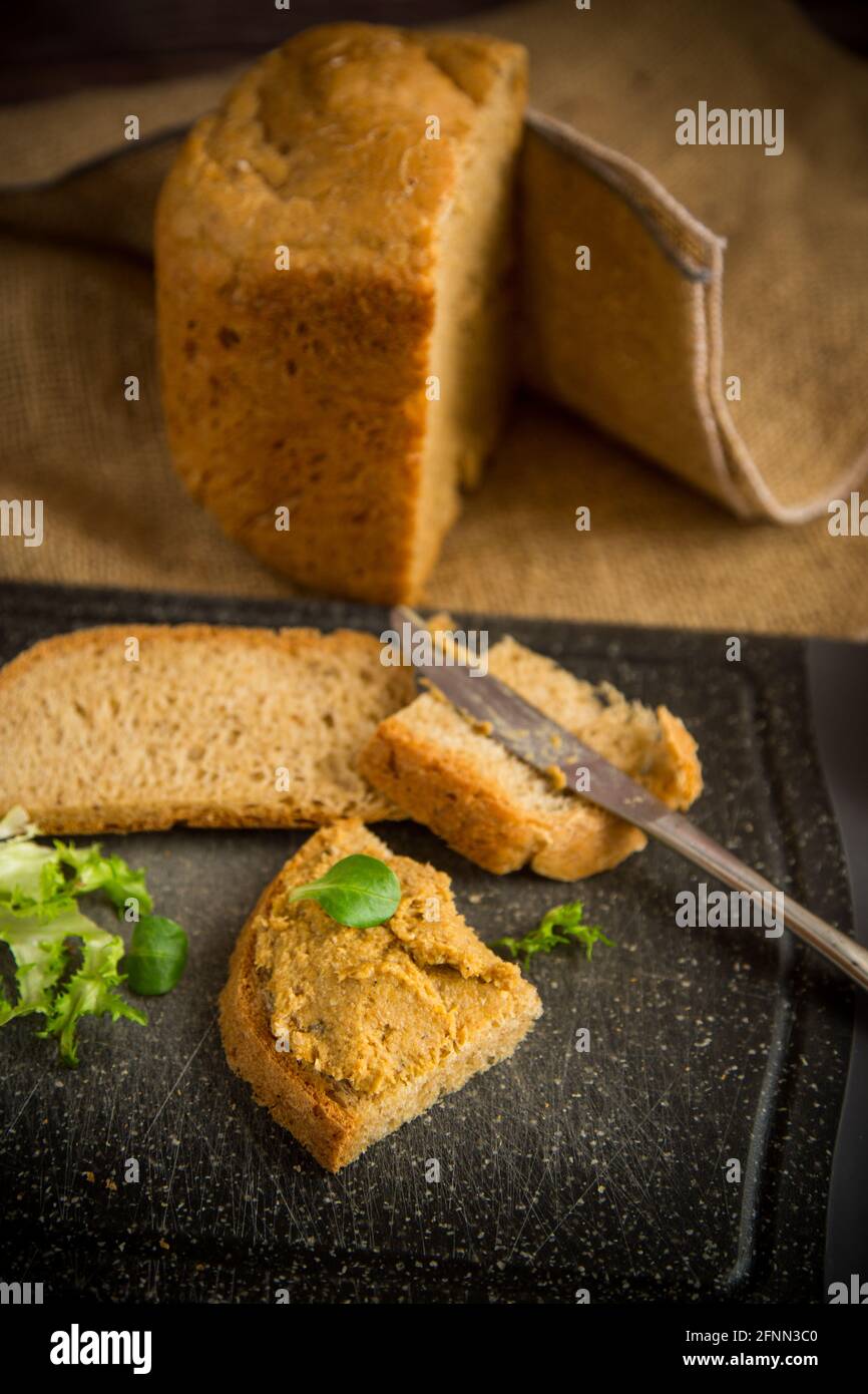 homemade meat pate with homemade bread on a wooden table Stock Photo ...