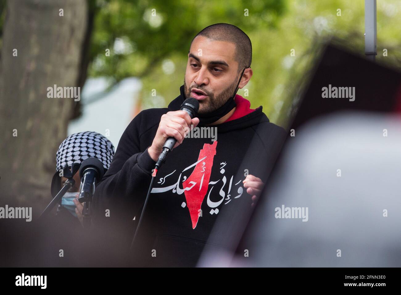 London, UK. 15th May, 2021. Rapper Lowkey addresses tens of thousands ...