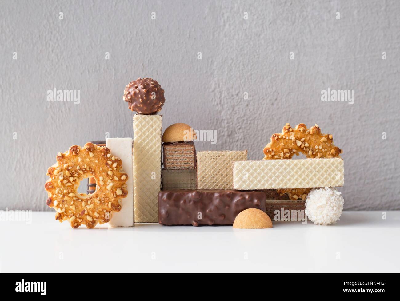 Horizontal geometric composition of sweet food with different shapes ...
