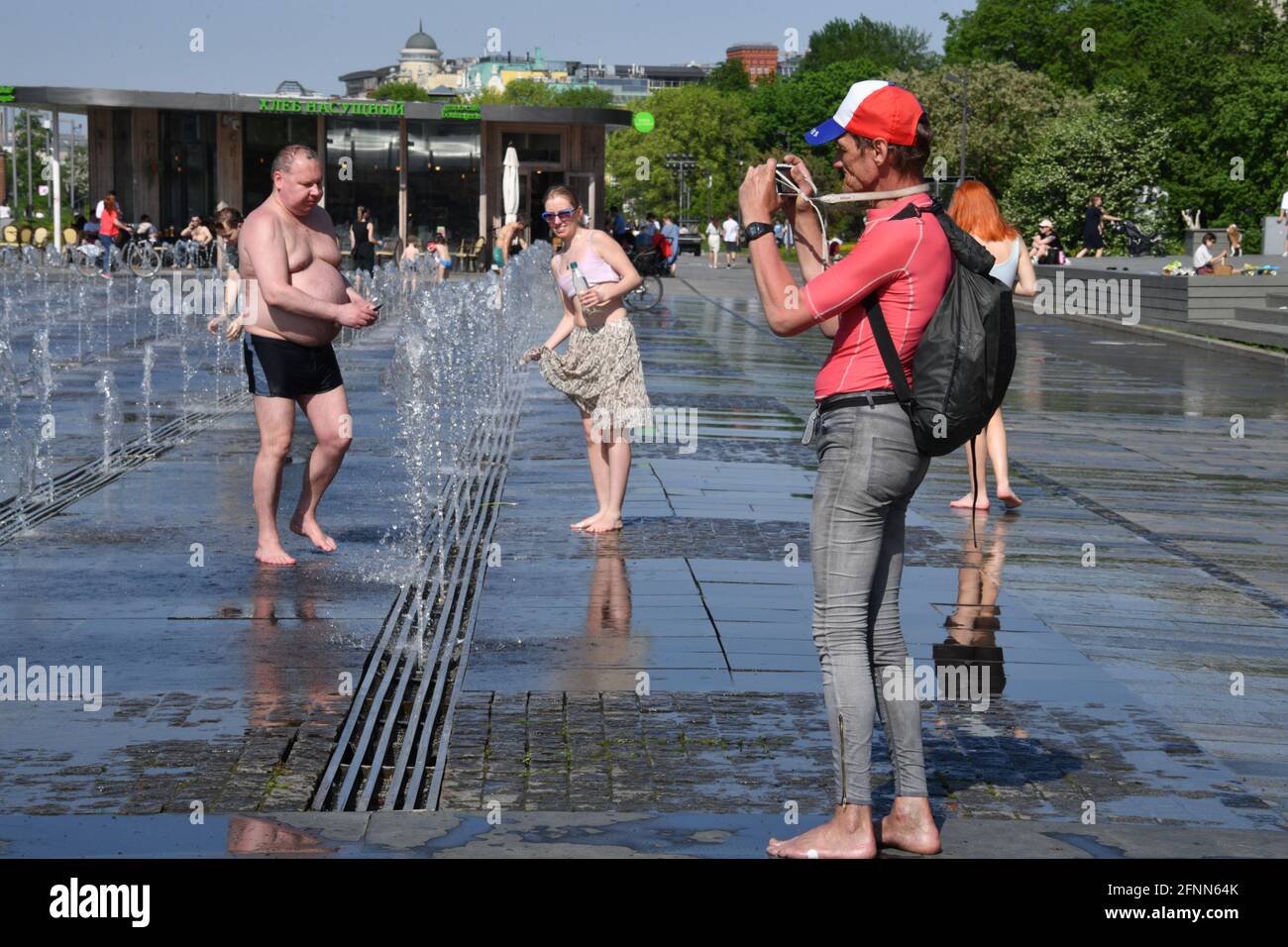 Moscow. People are resting on the territory of the dry fountain in the ...