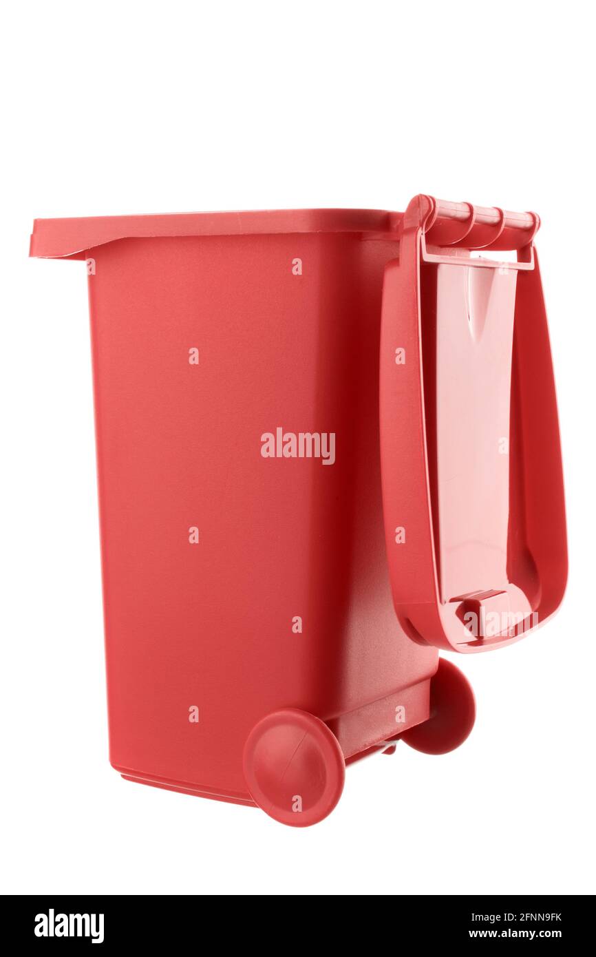 Plastic red trash can isolated on white background Stock Photo - Alamy
