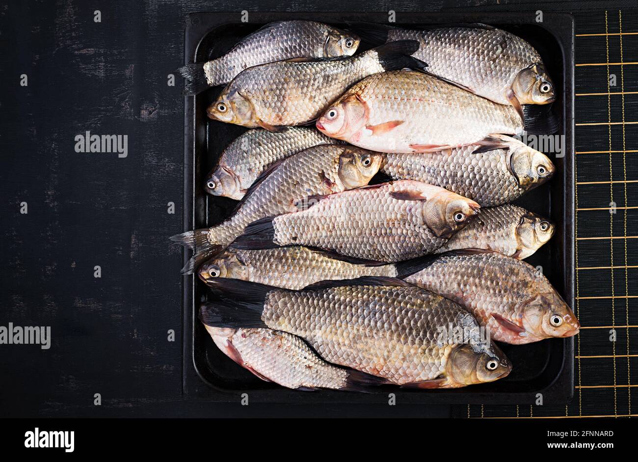 The raw crucians fish, live raw fish, crucian carp close-up. Top view ...