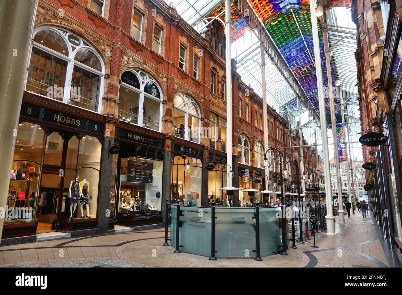 LEEDS, UK - JULY 11, 2016: People visit shops of Victoria Quarter in ...