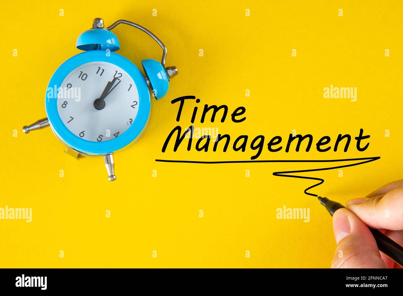 Hand writing Time Management with marker on yellow background, business ...