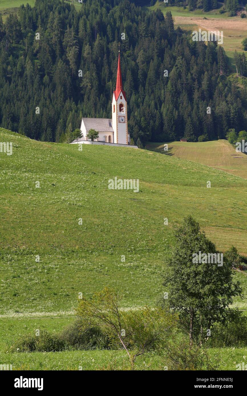 Italy - alpine village church in Prato Alla Drava. Small town with ...