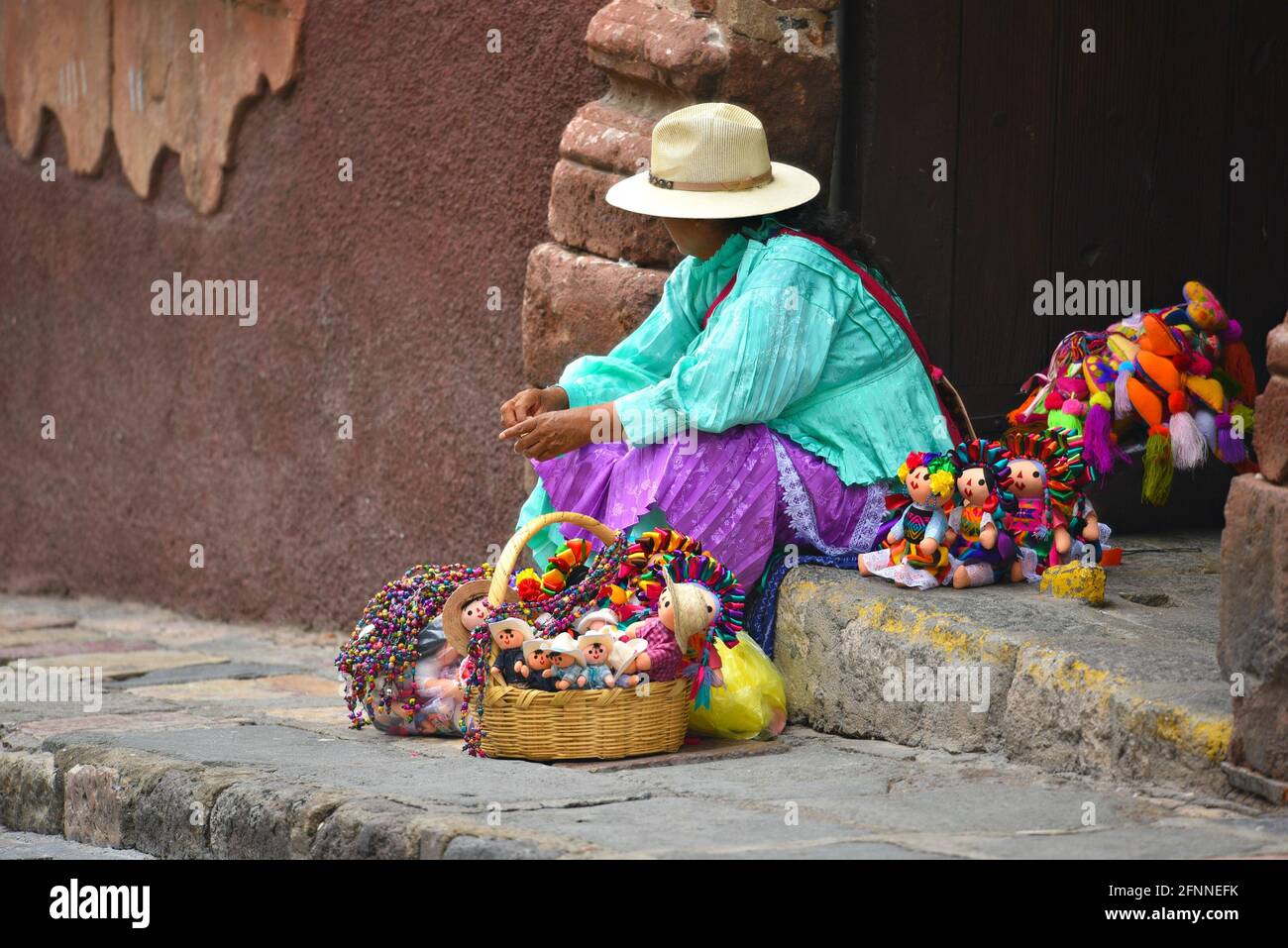 Indigenous woman selling authentic "Marias" the traditional handmade ...