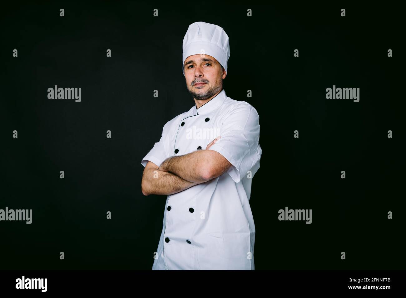 Cook poses hi-res stock photography and images - Alamy