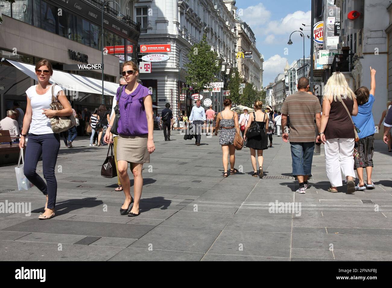 VIENNA, AUSTRIA - SEPTEMBER 5, 2011: People stroll in Karntner Strasse ...