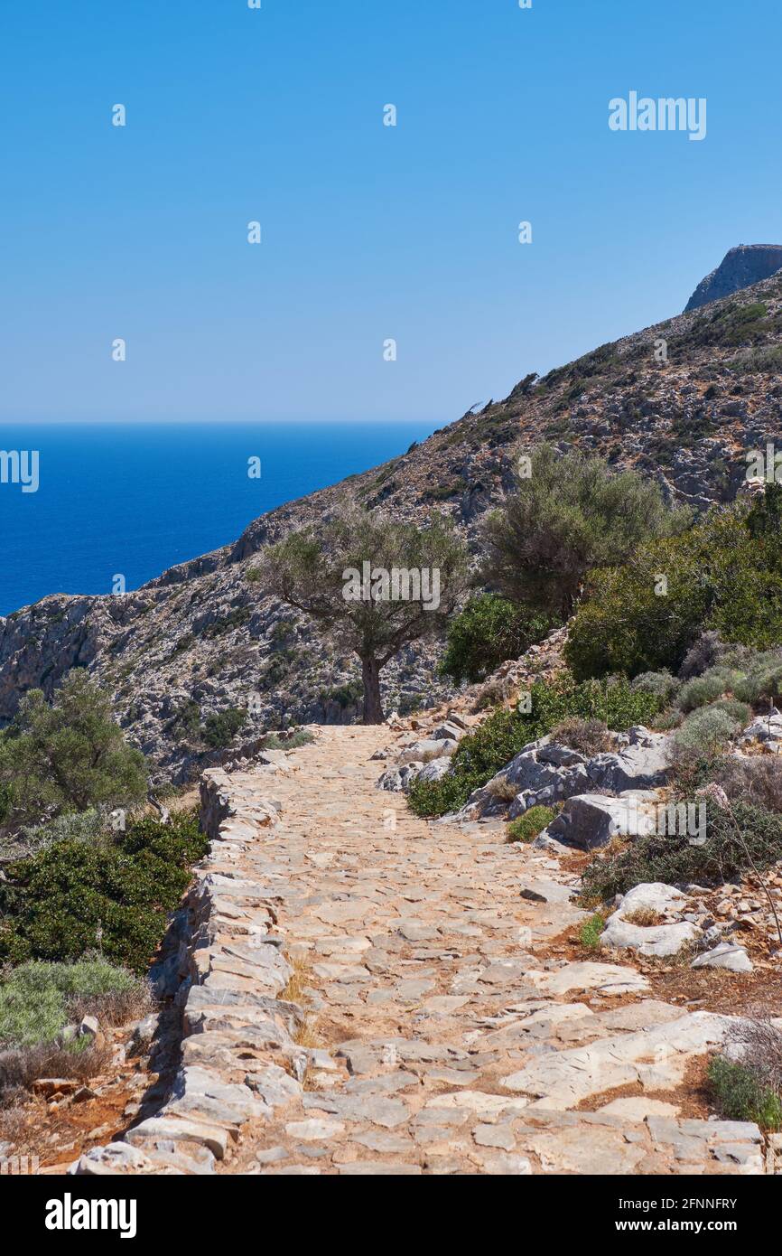 Stone walkway, pathway at the cliffs of the Mediterranean sea Stock ...