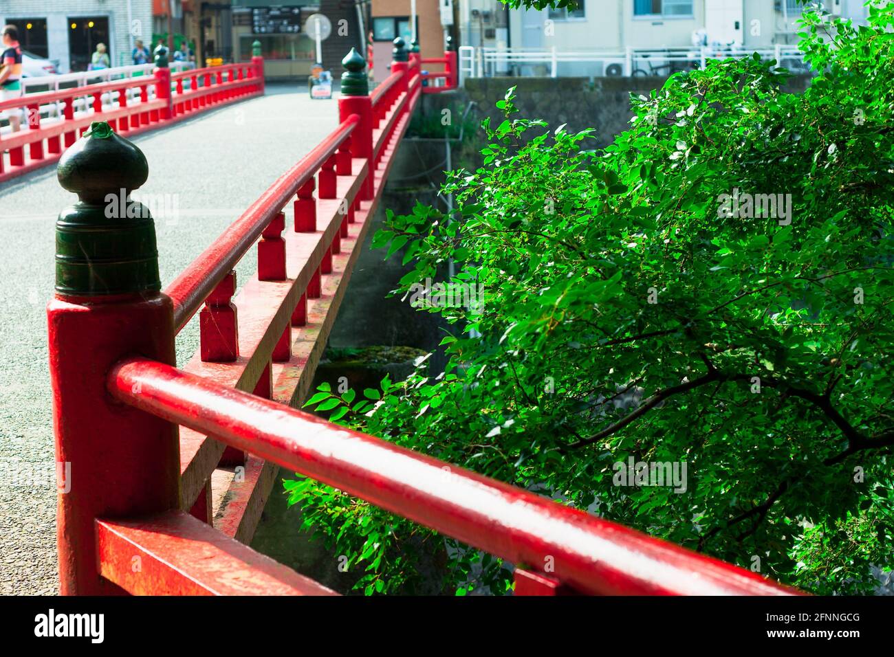 HA, JAPAN - Jul 04, 2016: A bridge with bright red railing and classic ...