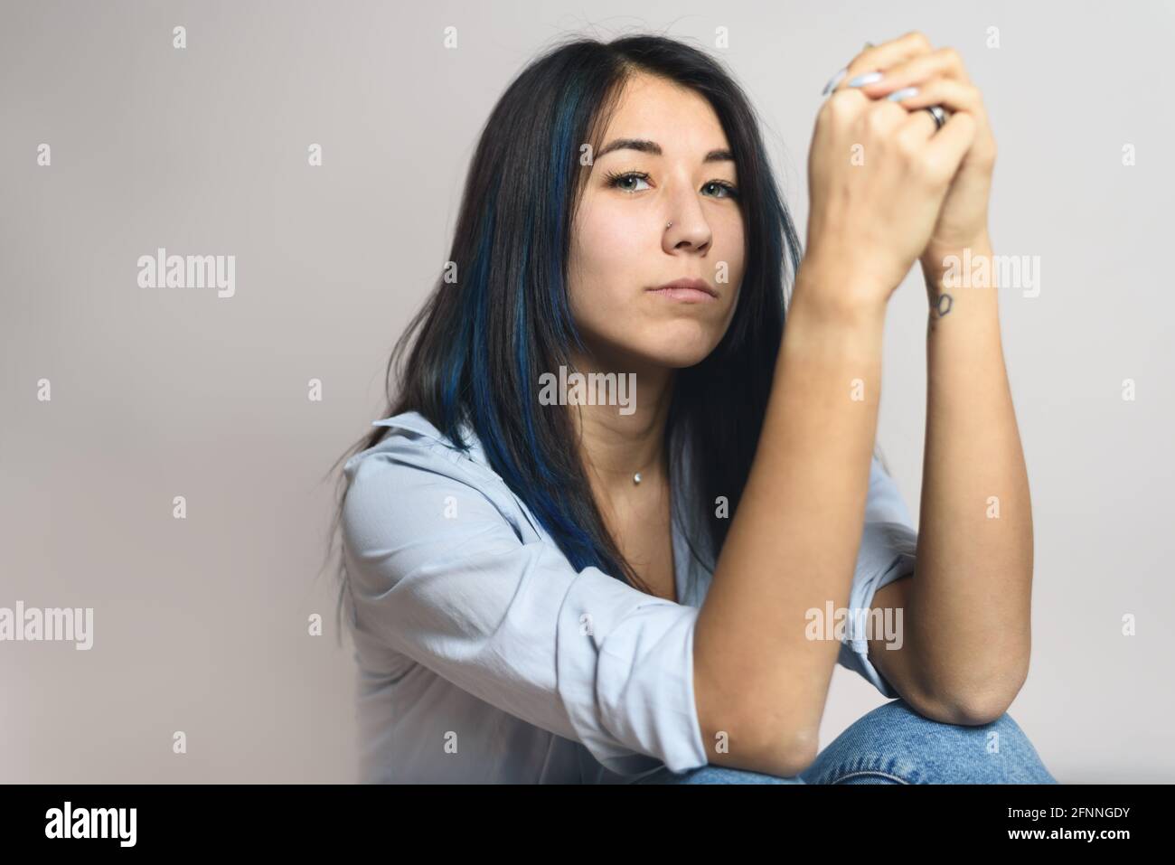 Portrait of satisfied young woman. Positive human emotion Stock Photo ...