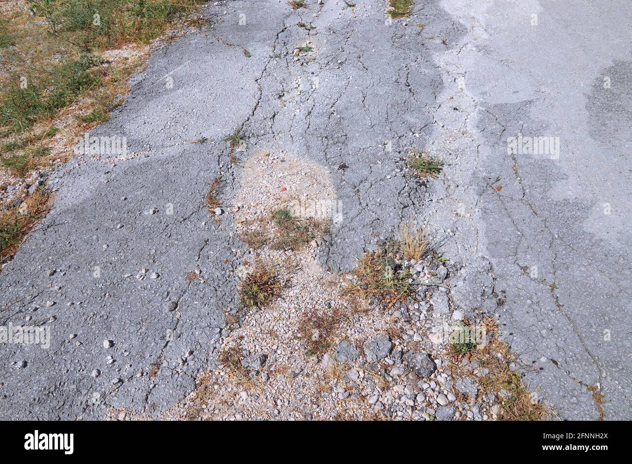 Damaged road in France. Countryside road maintenance concept Stock ...