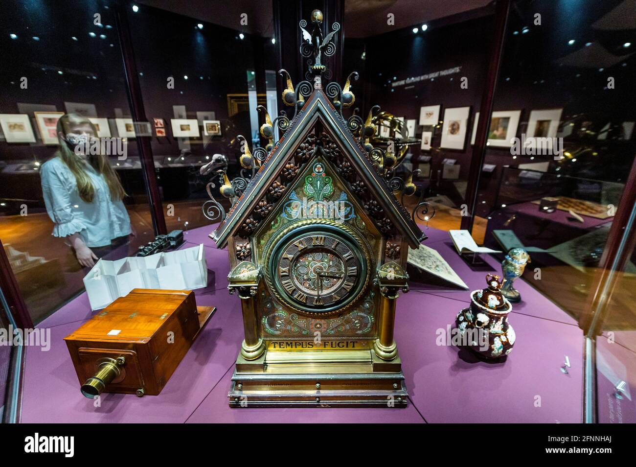 London, UK. 18 May 2021. An 1865 clock by Bruce James Talbert - Alice ...