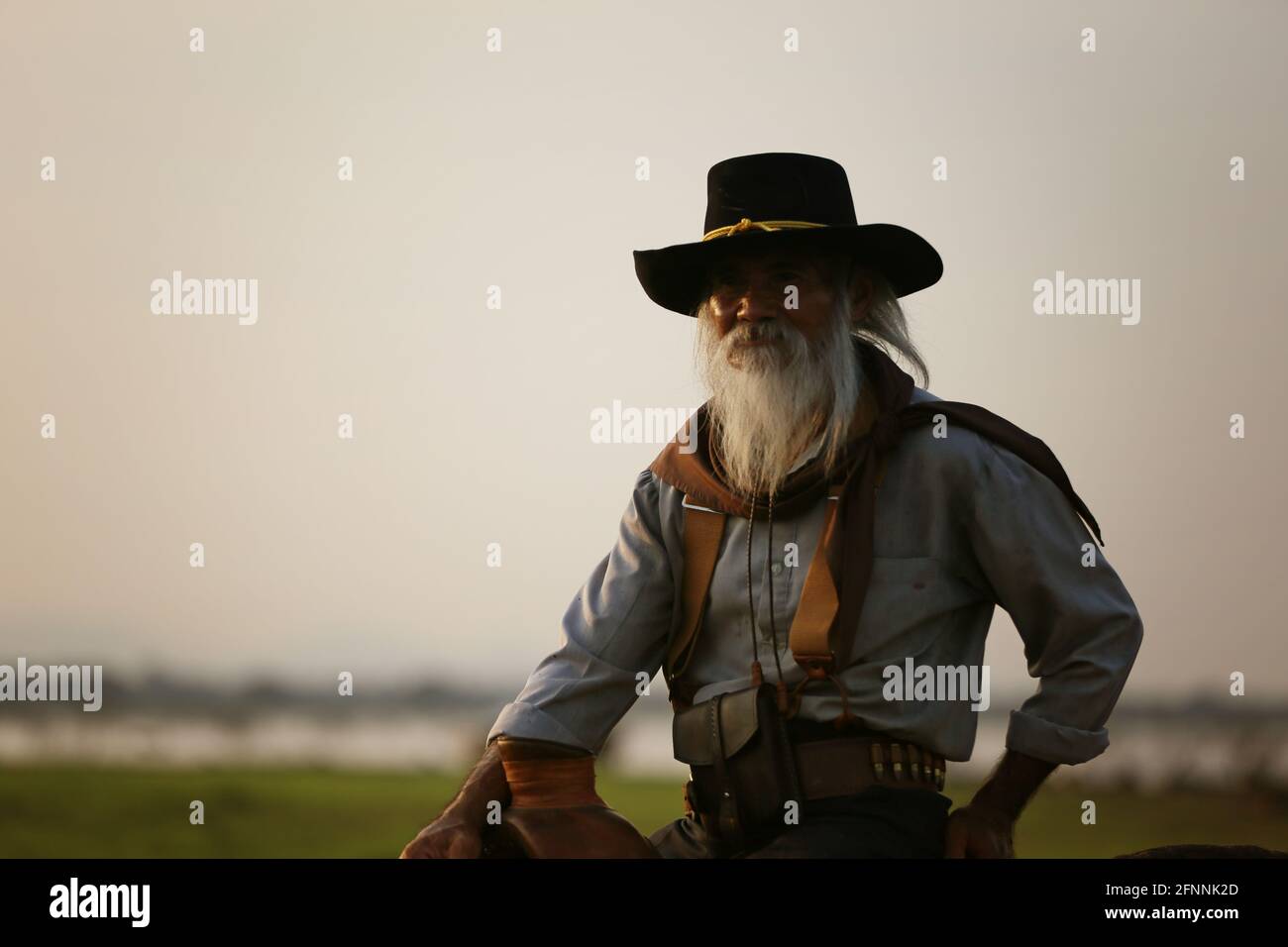 cowboy on horseback against a beautiful sunset, cowboy and horse at ...