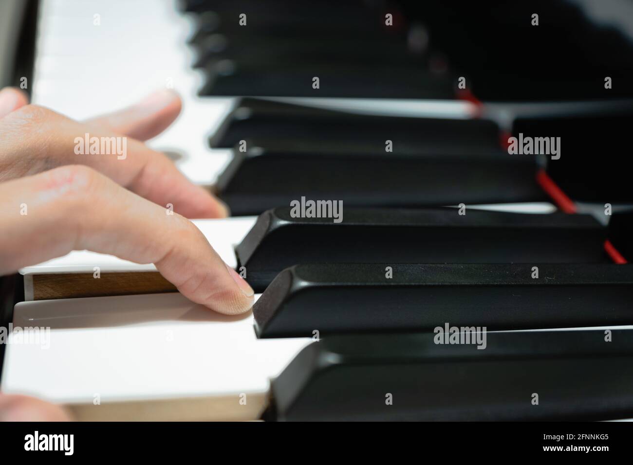 Piano keys on classical grand piano - closeup of piano keyboard for ...