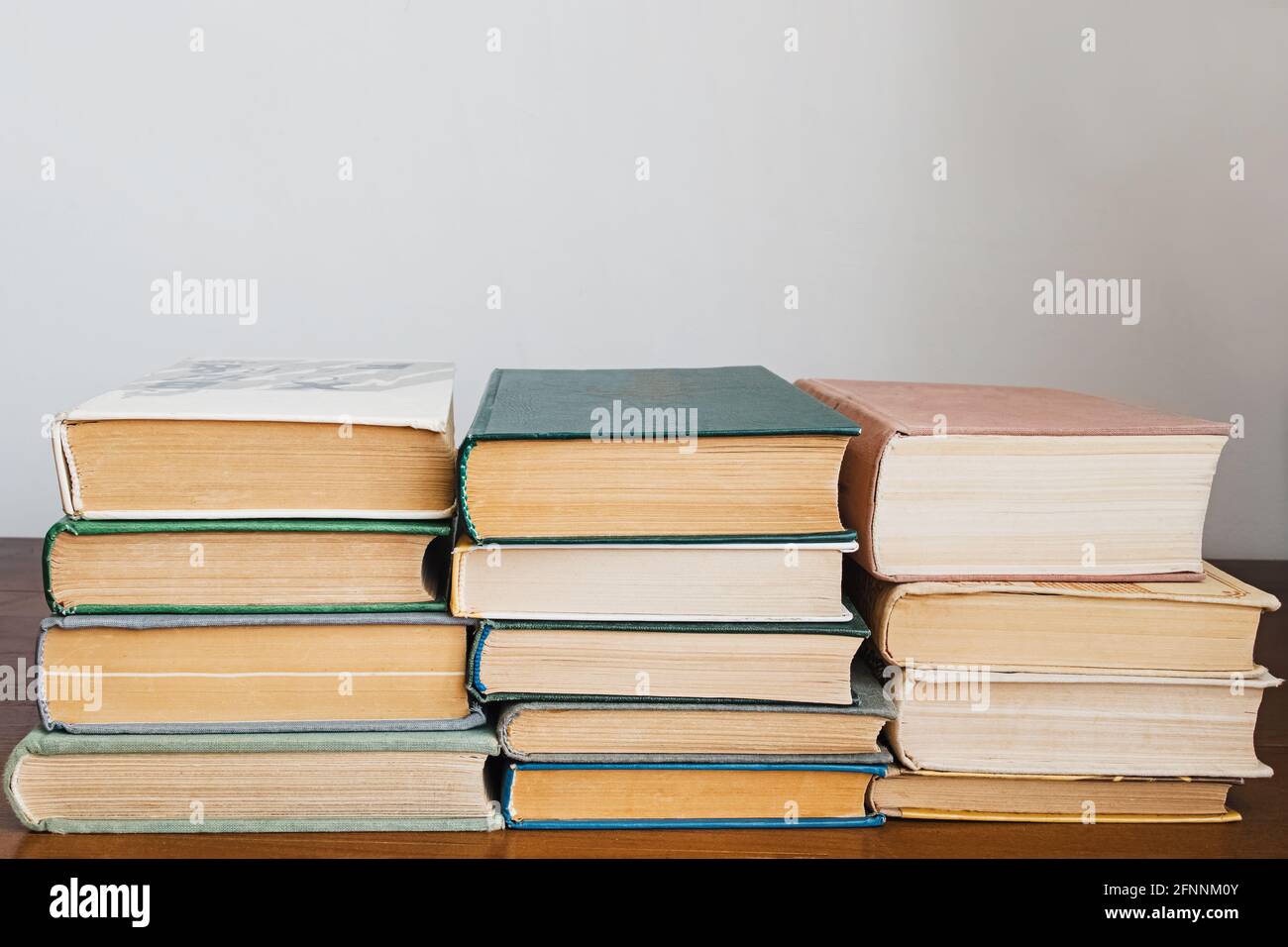 Old stacked books hi-res stock photography and images - Alamy