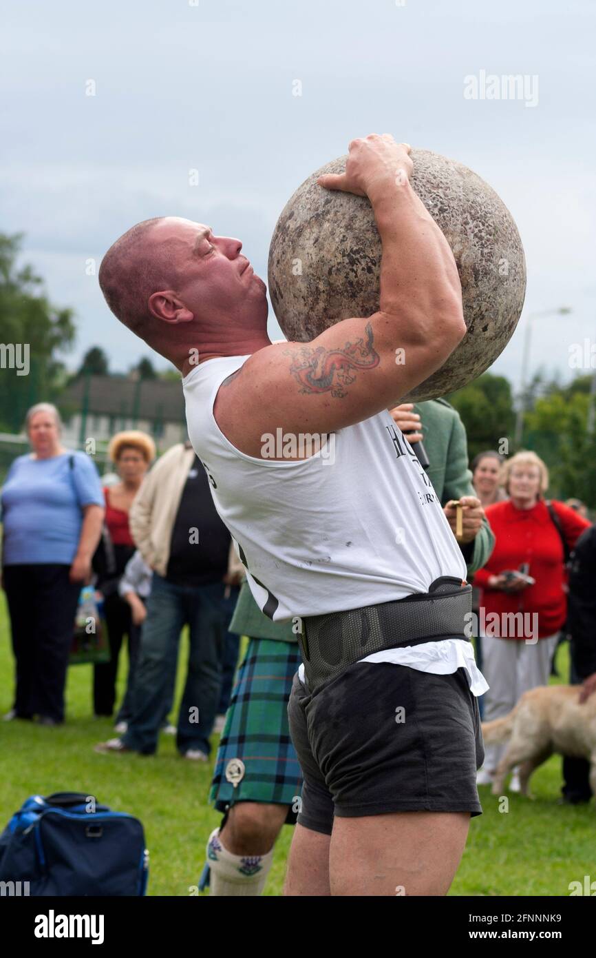 Ball lift at Helensburgh and Lomond Highland Games Stock Photo - Alamy