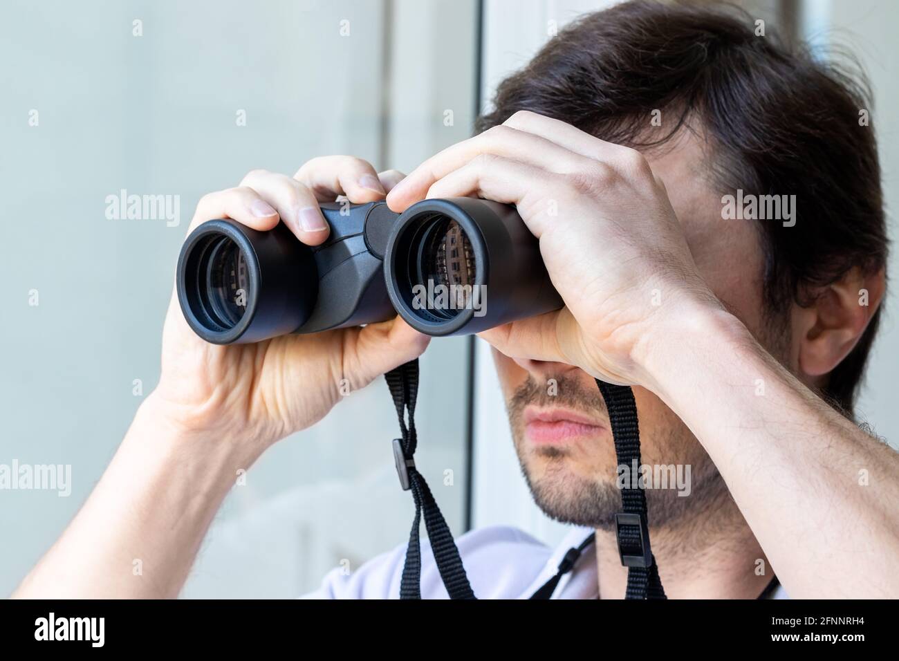 Man peeking window hi-res stock photography and images - Alamy