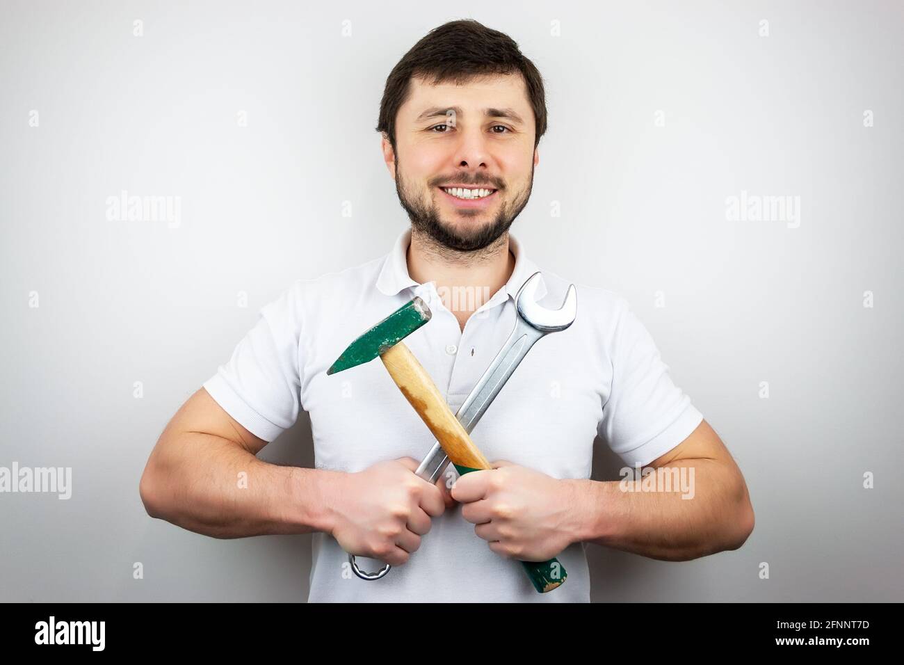 Man hand holding wrench hi-res stock photography and images - Alamy