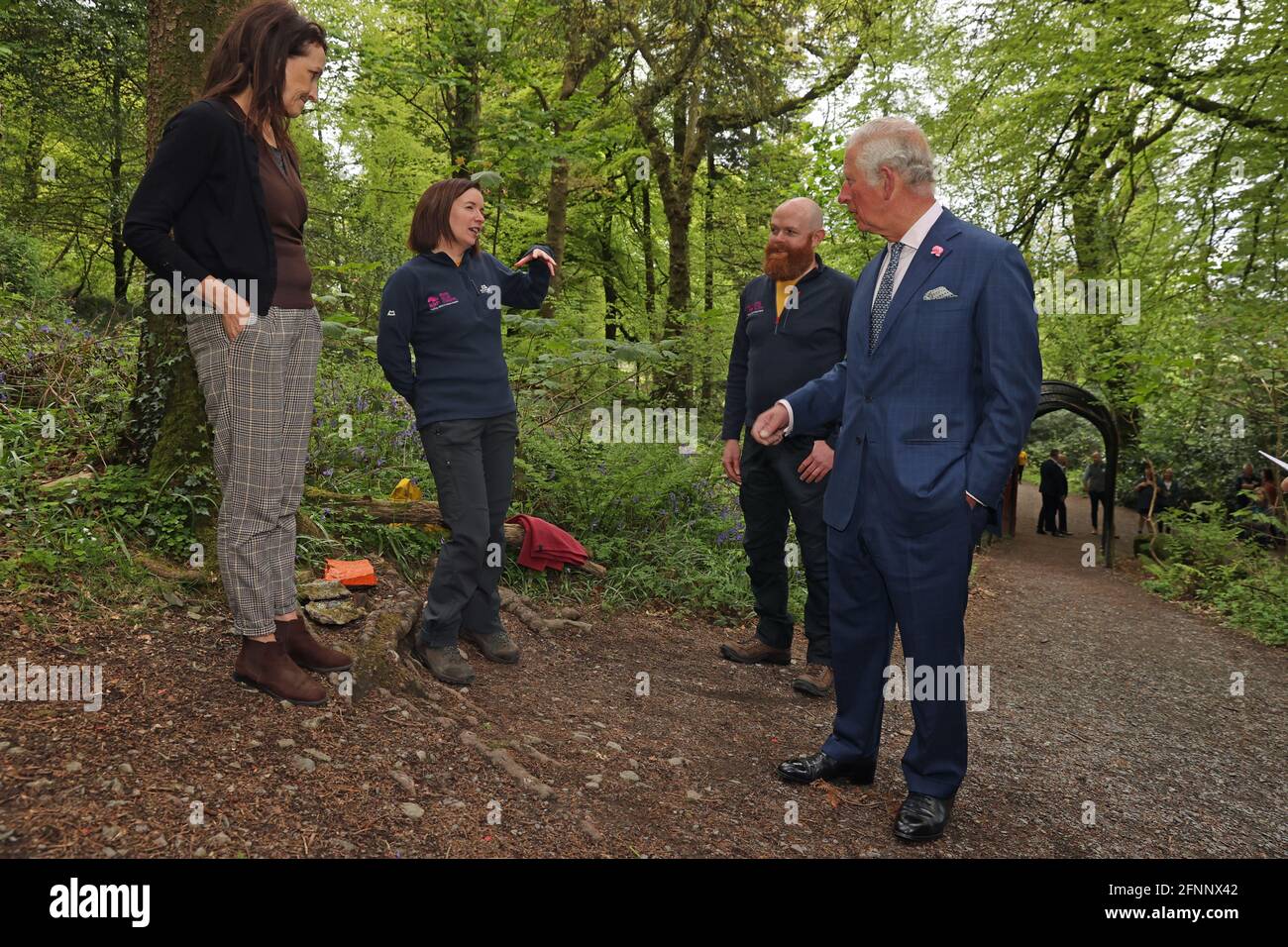 The Prince of Wales talks to staff during a visit to Slieve Gullion ...