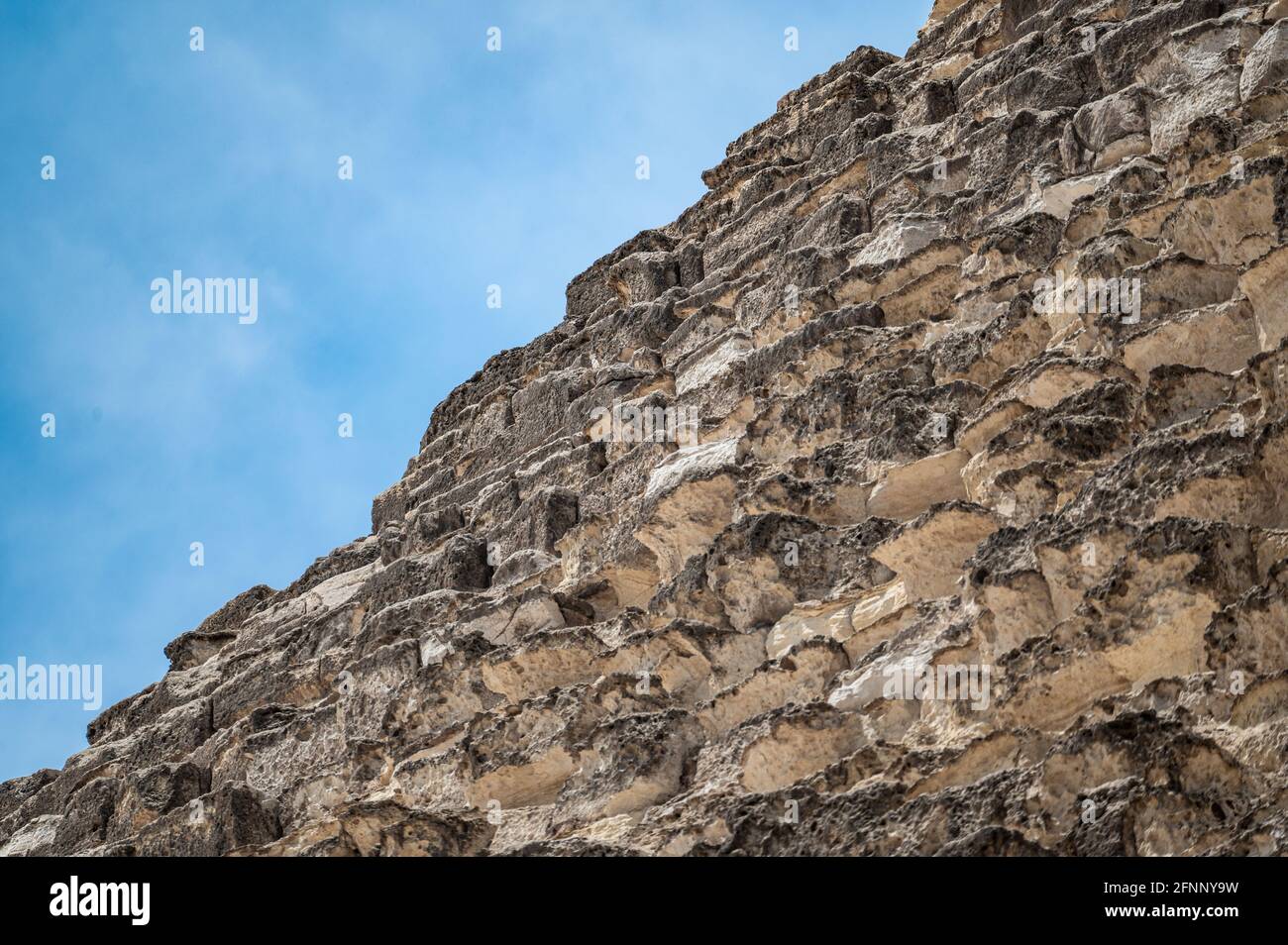 ancient stone blocks, part of the great pyramid, the face of the ...