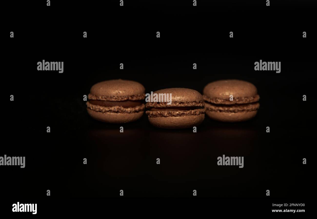 Pile of brown sweet macarons Stock Photo - Alamy