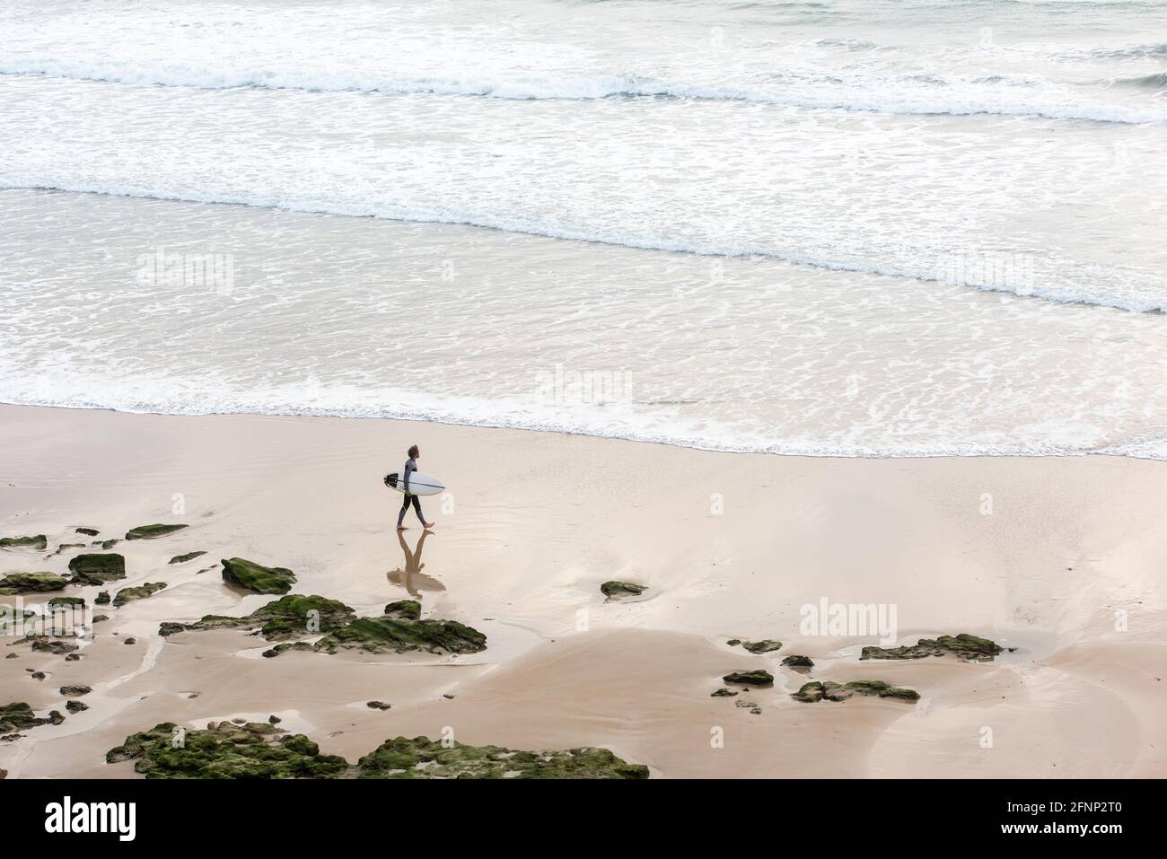 Man walking through rocks hi-res stock photography and images - Alamy