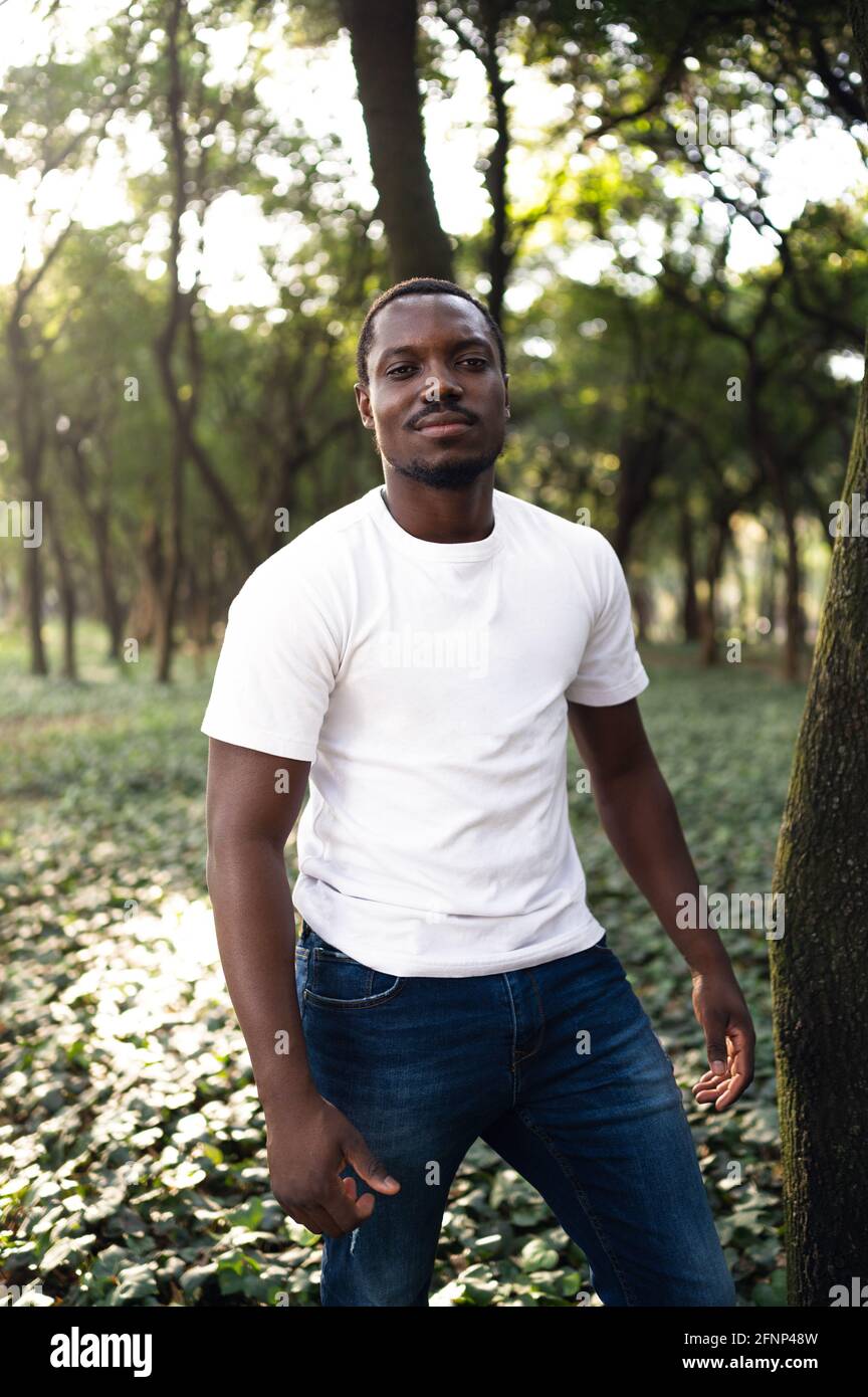 A young black man in park. Outdoor portrait of traveler. Portrait Stock ...