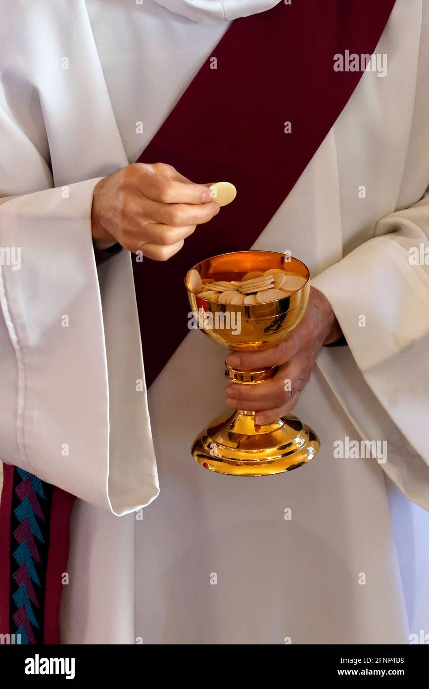 Saint Paul church. Catholic mass. Eucharist celebration. Holy communion ...